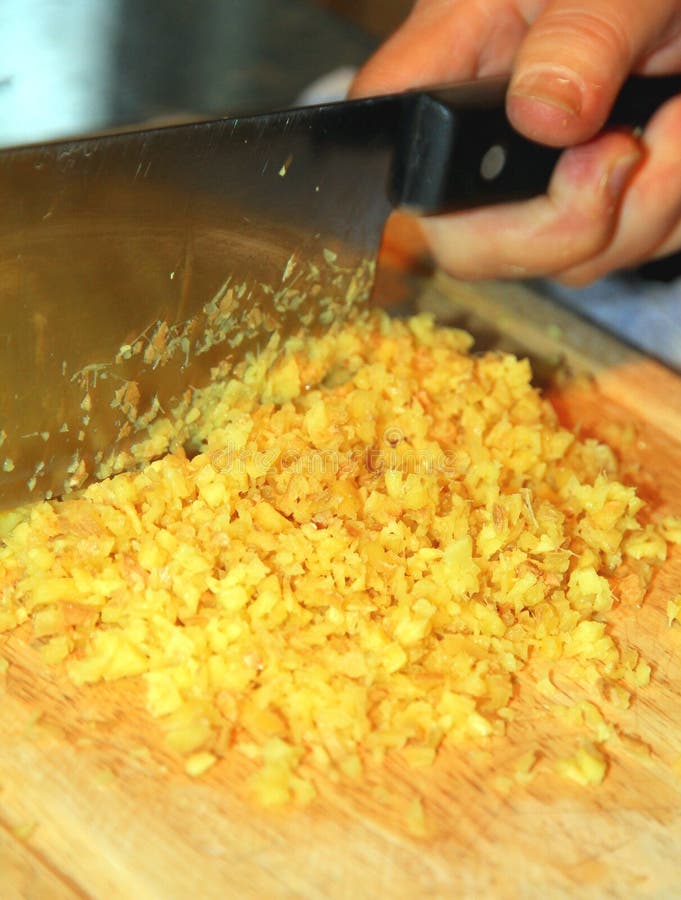 Chopping Ginger stock photo. Image of vegetable, blade - 50535032