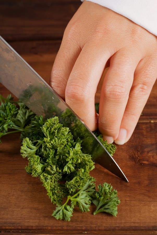 Chopping parsley stock image. Image of parsley, seasoning - 8235291