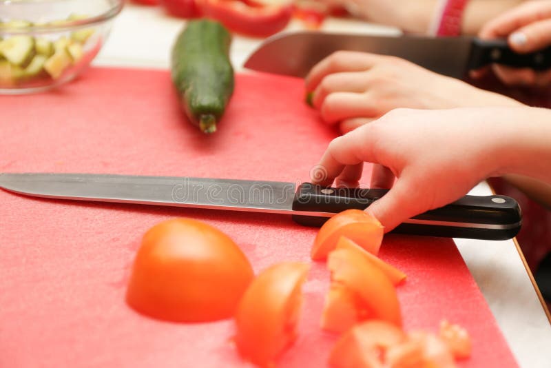 Chopping vegetables stock image. Image of tomato, hands - 36158665