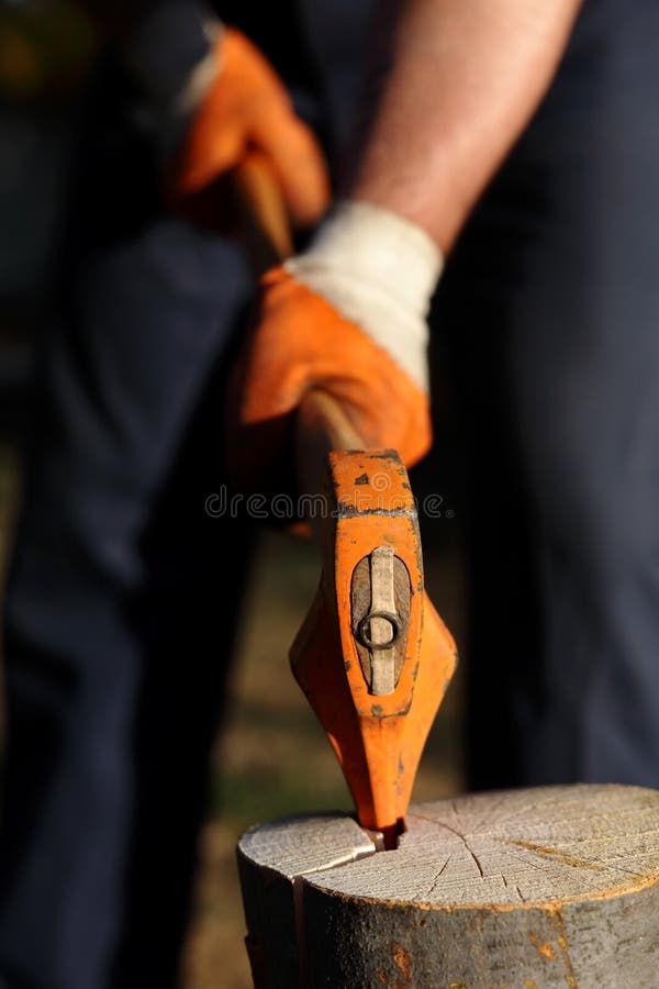Chopping wood with an axe stock image. Image of firewood - 26850261