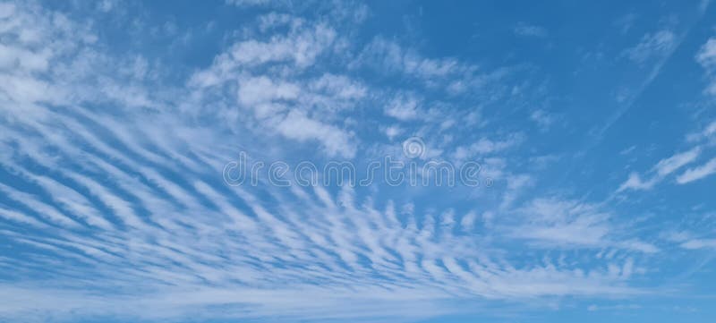 Choppy clouds in the sky stock image. Image of ocean - 233361885