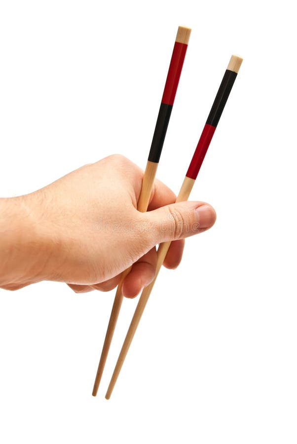 Chopsticks in hand stock photo. Image of gourmet, indigenous - 17106918