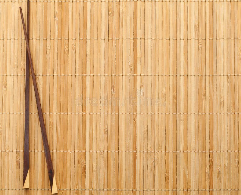 Chopsticks on straw mat stock photo. Image of oriental - 24325718