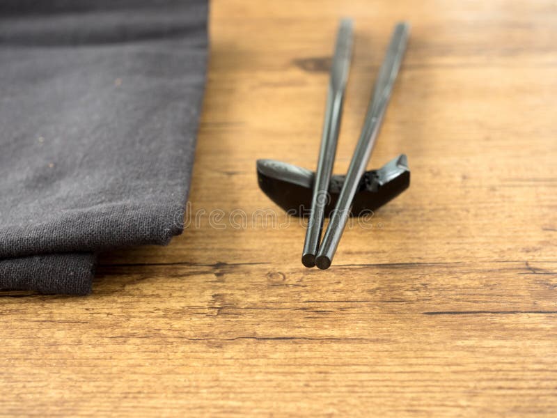 Chopsticks on a table stock image. Image of restaurant - 52417527