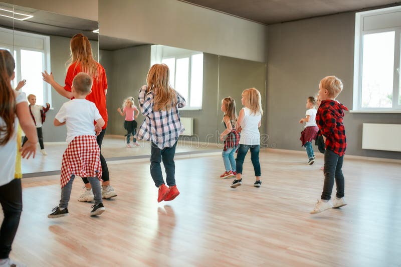 Choreography Class. Group of Active Children Dancing in Front of the ...