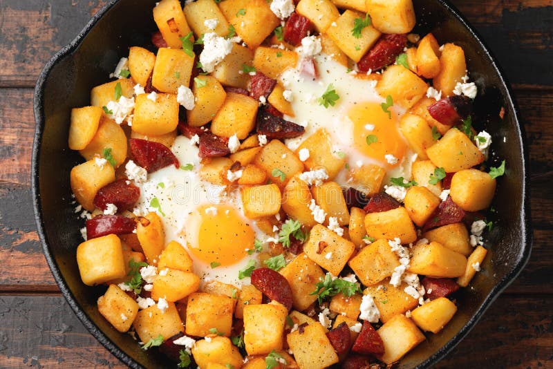 Chorizo Potato Hash Breakfast with Eggs and Feta Cheese in Cast Iron ...