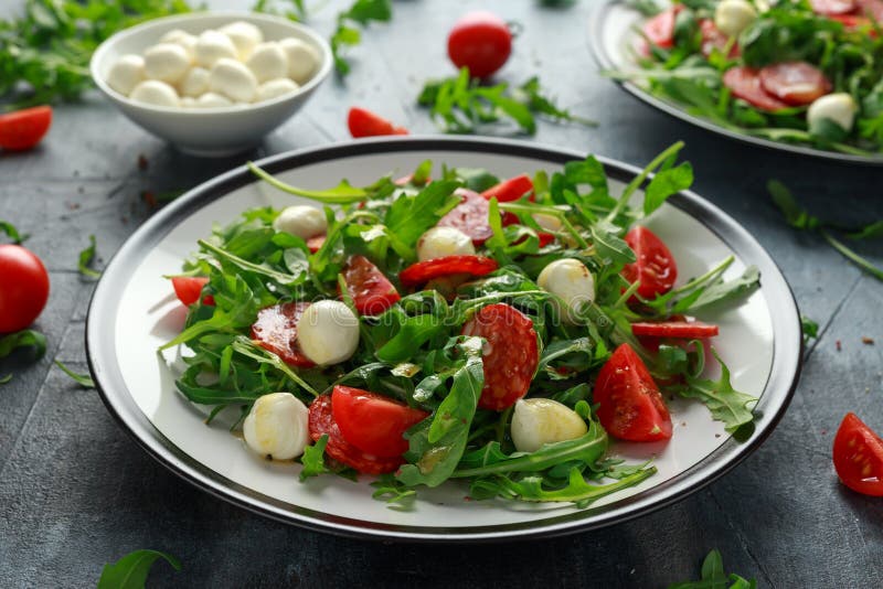 Chorizo Salad with Cherry Tomatoes, Mozzarella and Wild Rucola Stock ...