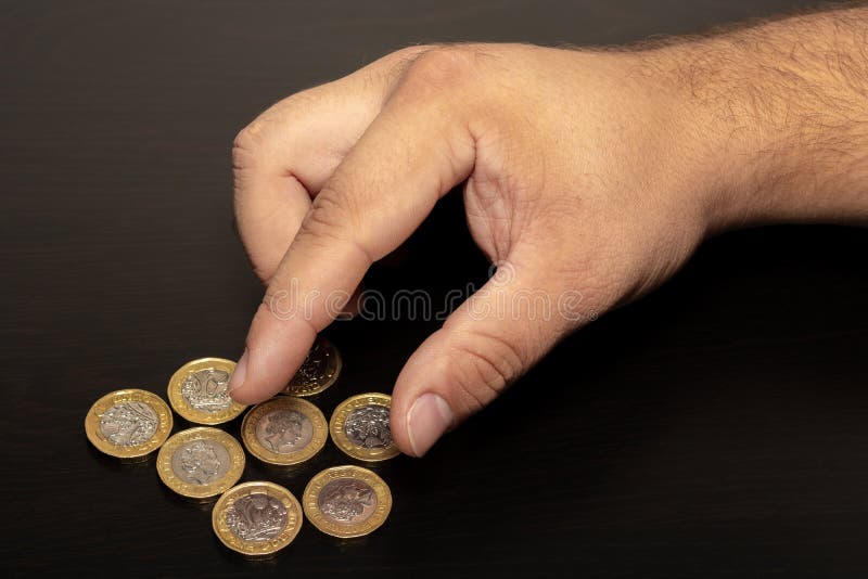 Chosing One Pound from the Table Stock Image - Image of britain, great ...