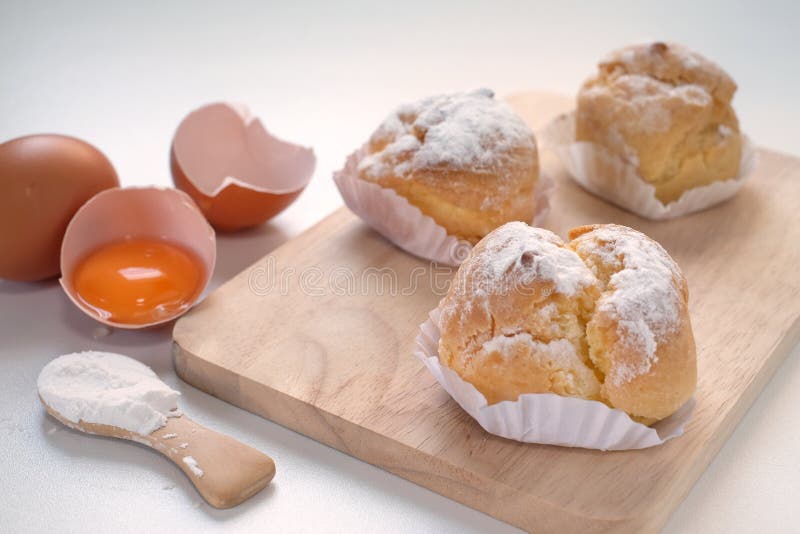 Choux Cream , Chu Cream in Wooden Tray on White Table Stock Image ...