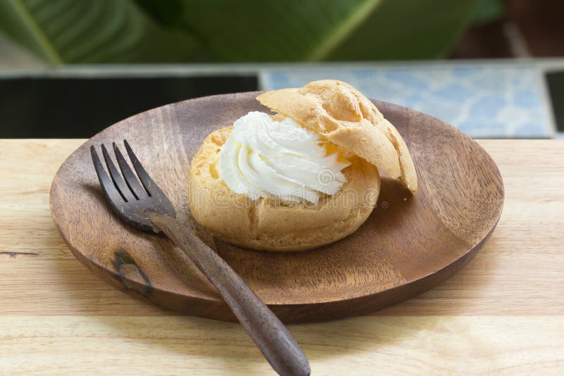 Choux Cream on plate stock image. Image of baked, puff - 76190639