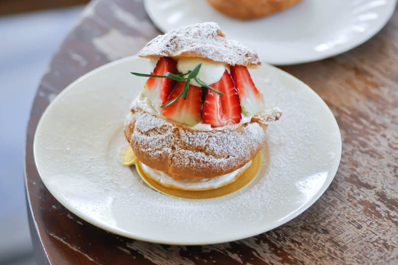 Choux Cream or Cream Puff, Eclair or Strawberry Choux Cream Stock Image ...