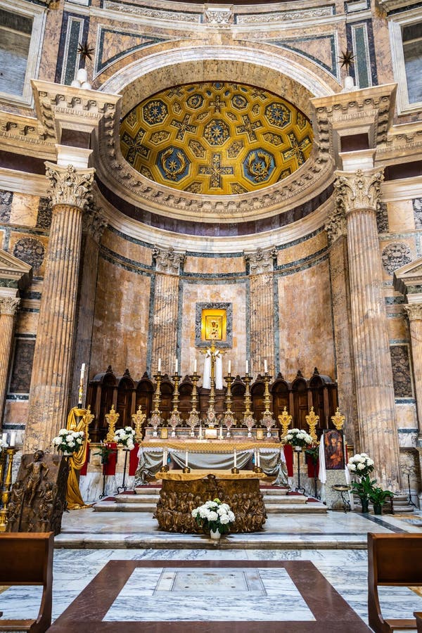 A Christian Alter. Images of Jesus and Mother Mary with a Garland of ...
