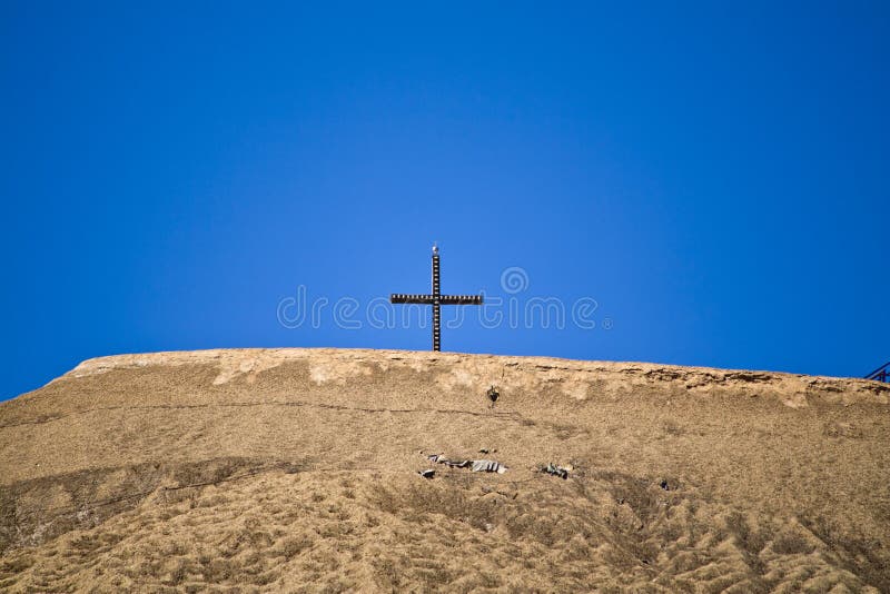 A Christian Cross on an Artificial Mountain Where Mining is Operated in ...