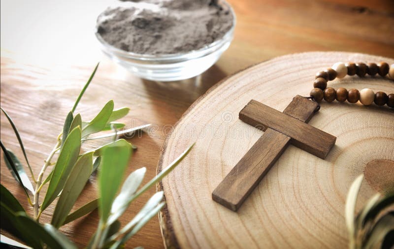 Christian Cross on Wooden with Leaves and Ashes Elevated View Stock ...