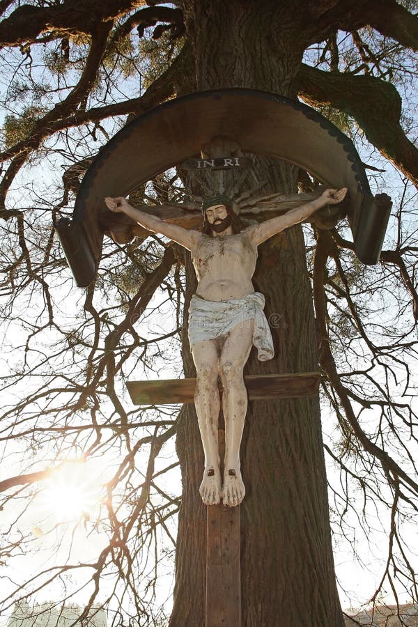 Christian Wayside Cross with Jesus Statue Stock Photo - Image of ...