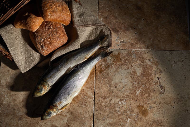 Christianity Background. Loaves of Bread and Two Fish in a Basket ...