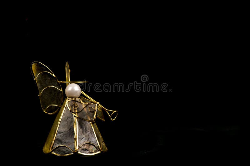 Christmas Angel Decoration with Trumpet on Black. Stock Image - Image ...