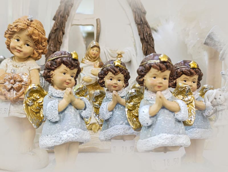 Christmas Angel Figurines on a Store Shelf Stock Image - Image of snow ...