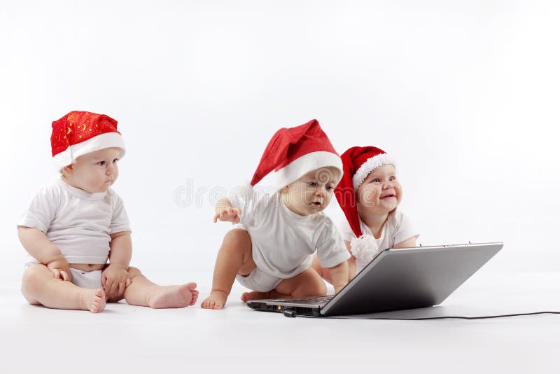 Christmas Babies with Laptop Stock Image - Image of cheerful, early ...