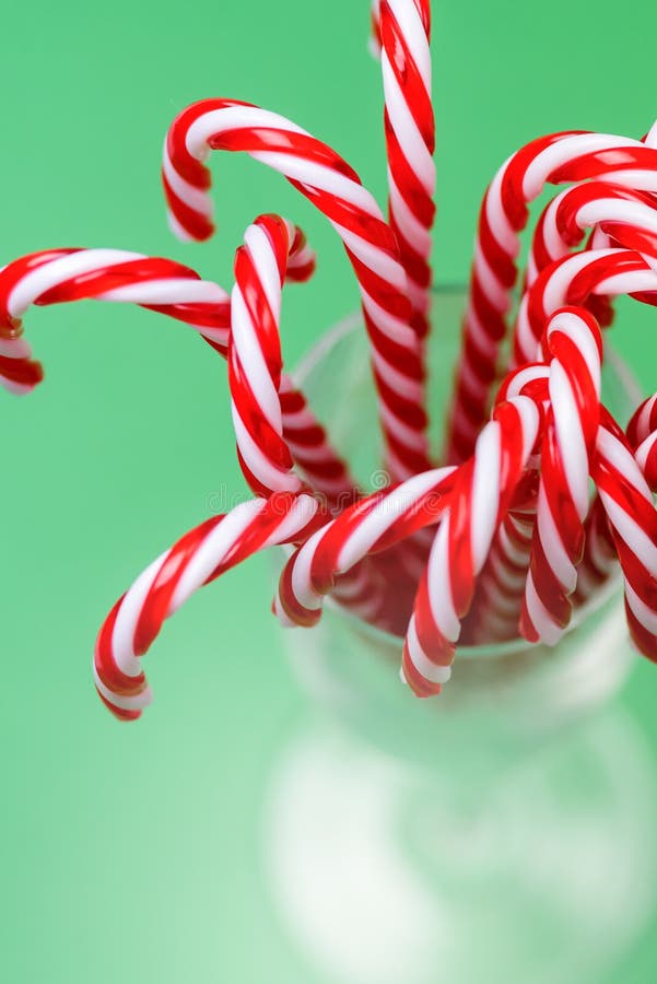 Christmas Background with Candy Canes Green Background Vertical Holiday ...