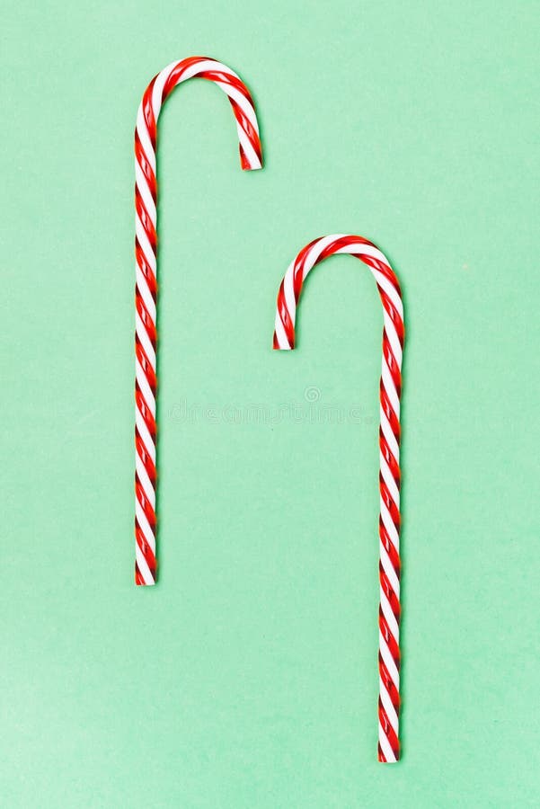 Christmas Background with Candy Canes Green Background Vertical Holiday ...