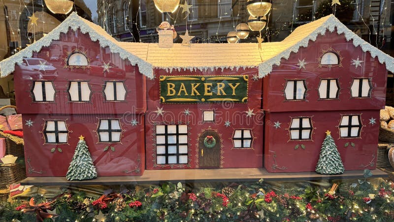 Christmas Bakery Display with Three Interconnected Buildings Stock ...