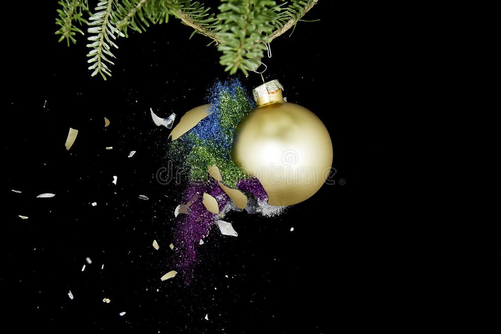 Christmas Ball Exploding. Colored Glitters Falling. Stock Photo - Image ...