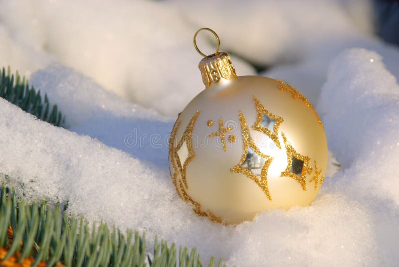 Christmas ball in snow stock photo. Image of makro, spruce - 12261044
