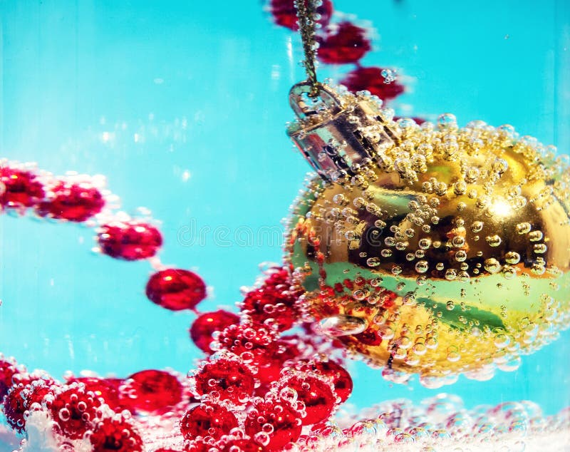 Christmas Ball in Water with Bubbles, Christmas Card Concept Stock ...