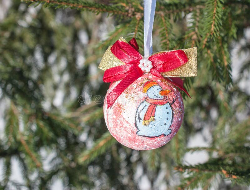 Christmas Balls on a Blurred Natural Background and Falling Snow Stock ...