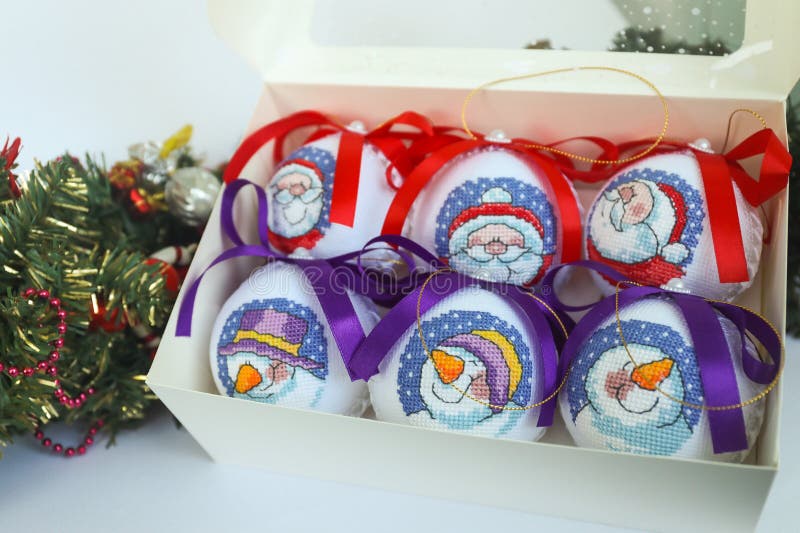 Christmas Balls Decorated with Snowmen and Santa Clauses in a Box Stock ...