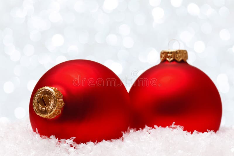 Red Christmas Balls in the Snow Stock Photo - Image of freeze, holiday ...