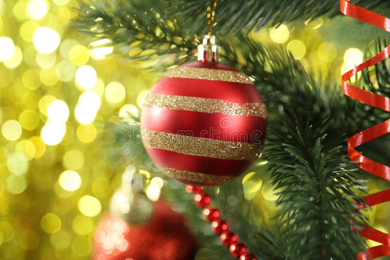 Christmas Baubles on Christmas Tree on Lights Background, Close Up ...