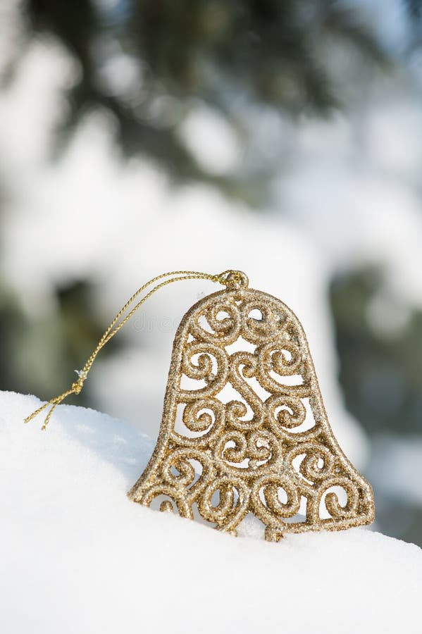 Christmas bell in snow stock photo. Image of closeup - 29148756