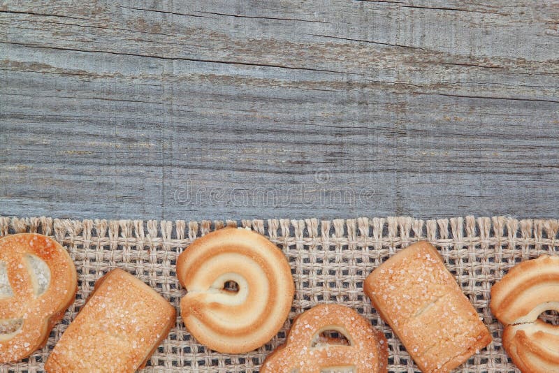 Christmas Biscuits on Sacking Texture and Wood. Stock Photo - Image of ...