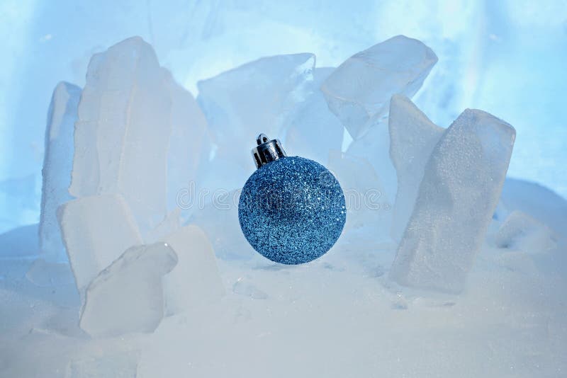 Christmas Blue Shiny Ball on Beautiful Blue Ice. Stock Image - Image of ...