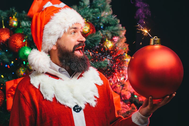 Christmas Bomb. Christmas Surprise. Bearded Santa is Holding a Toy for ...