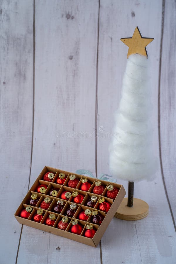 Christmas Bright Red Small Balls for a Tree in a Cardboard Box with ...