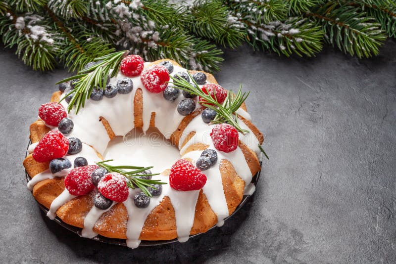 Christmas Cake with Berries and Fir Tree Stock Photo - Image of icing ...