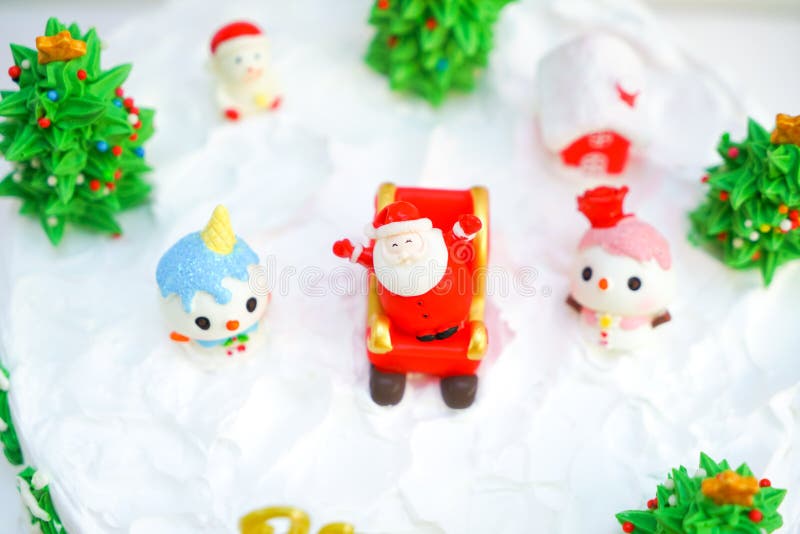 Christmas Cake Decorated with Sweet Figures of Christmas Tree, Santa ...