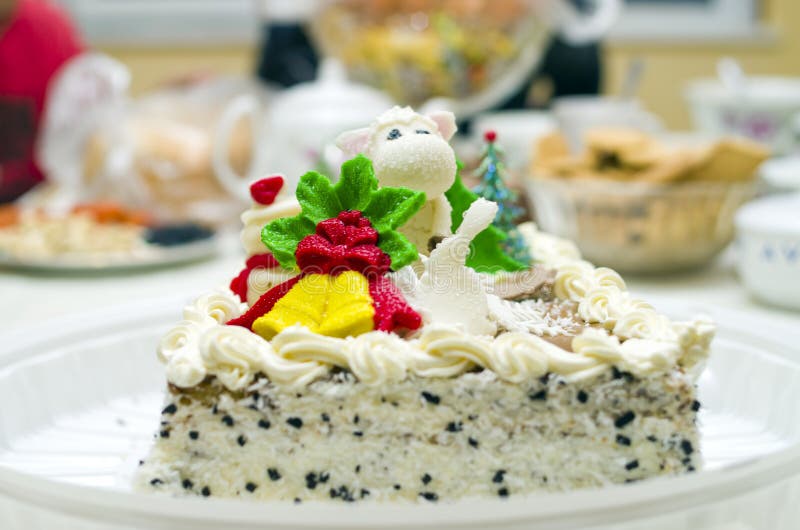 Christmas cake on a table stock photo. Image of white - 48558800