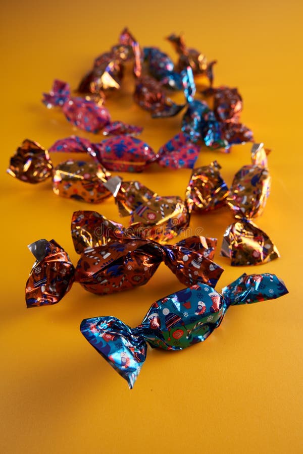 Christmas candies wrapped stock image. Image of plastic - 236519757