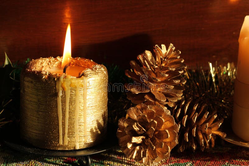 Christmas Candle and Pine Cones Stock Photo - Image of reflective ...