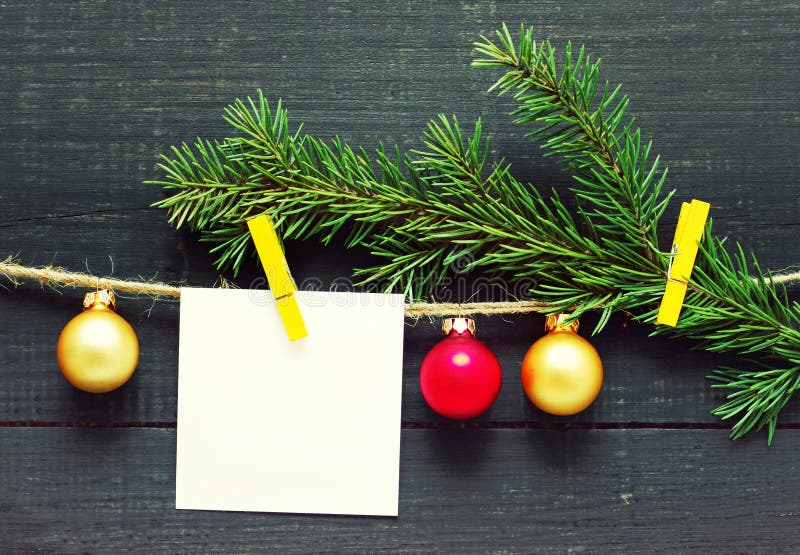 Christmas Card with Christmas Tree Decorations and a Fir Tree Branch on ...