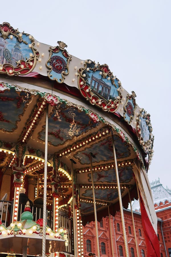 Christmas Carousel with Horses and Lights Vertical Photo Stock Image ...
