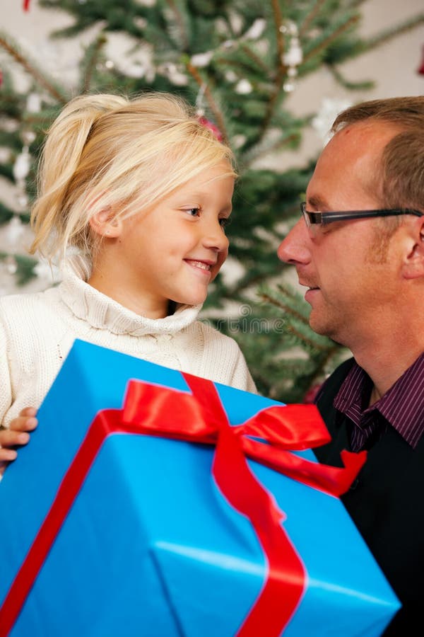 Christmas - Child Receiving a Gift Stock Image - Image of excitement ...