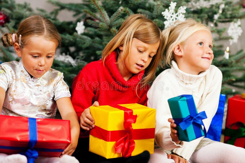 Christmas - Children with Presents Stock Image - Image of giving, child ...