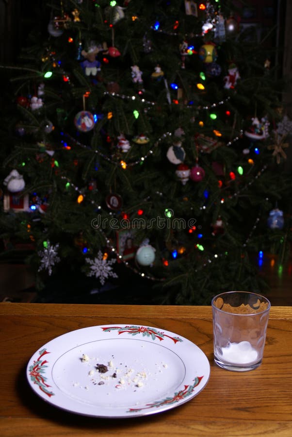 Christmas Cookie Crumbs by Christmas Tree Stock Photo - Image of milk ...