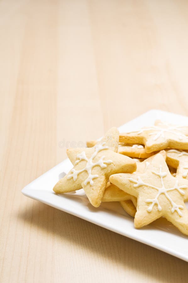 Plate of Iced Christmas Cookies on White Stock Image - Image of yellow ...