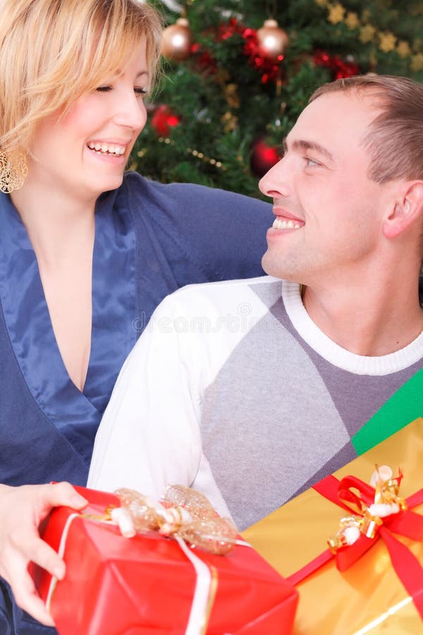Present couple stock photo. Image of christmas, romance - 17000456